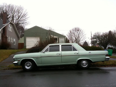 OLD PARKED CARS.: 1965 AMC Rambler Classic 550 Sedan.