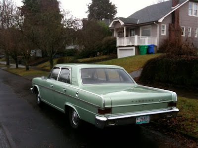 OLD PARKED CARS.: 1965 AMC Rambler Classic 550 Sedan.