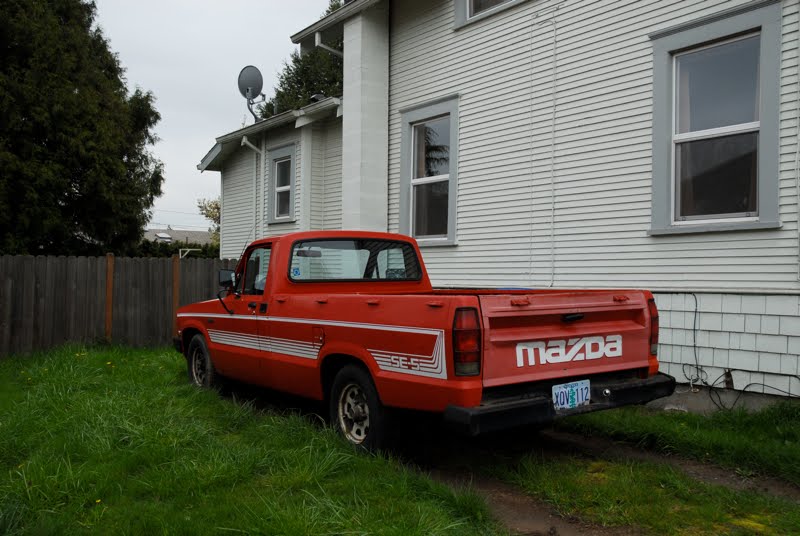OLD PARKED CARS.: 1984 Mazda B2000 SE-5 Pickup.