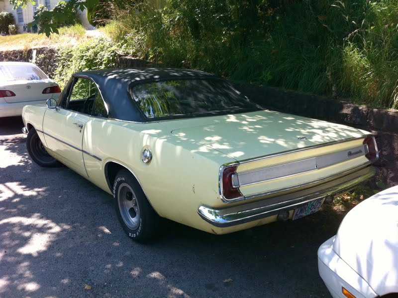 OLD PARKED CARS.: 1967 Plymouth Barracuda Notchback.
