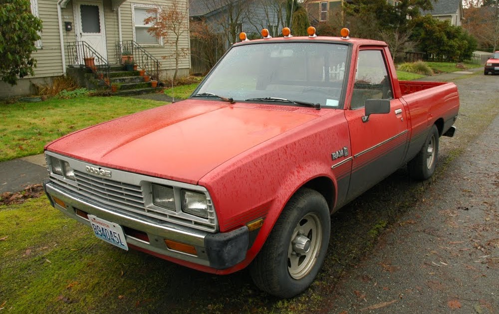 OLD PARKED CARS.: 1985 Dodge Ram 50.