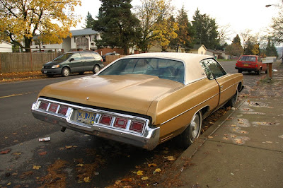 OLD PARKED CARS.: 1973 Chevrolet Impala Custom.
