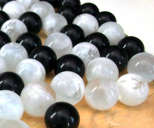 Nicole's Inner Voice: Three Boxes of Black and White Marbles