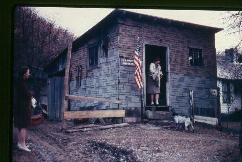 Sliding through life: Mistletoe, KY and Sunday Sign