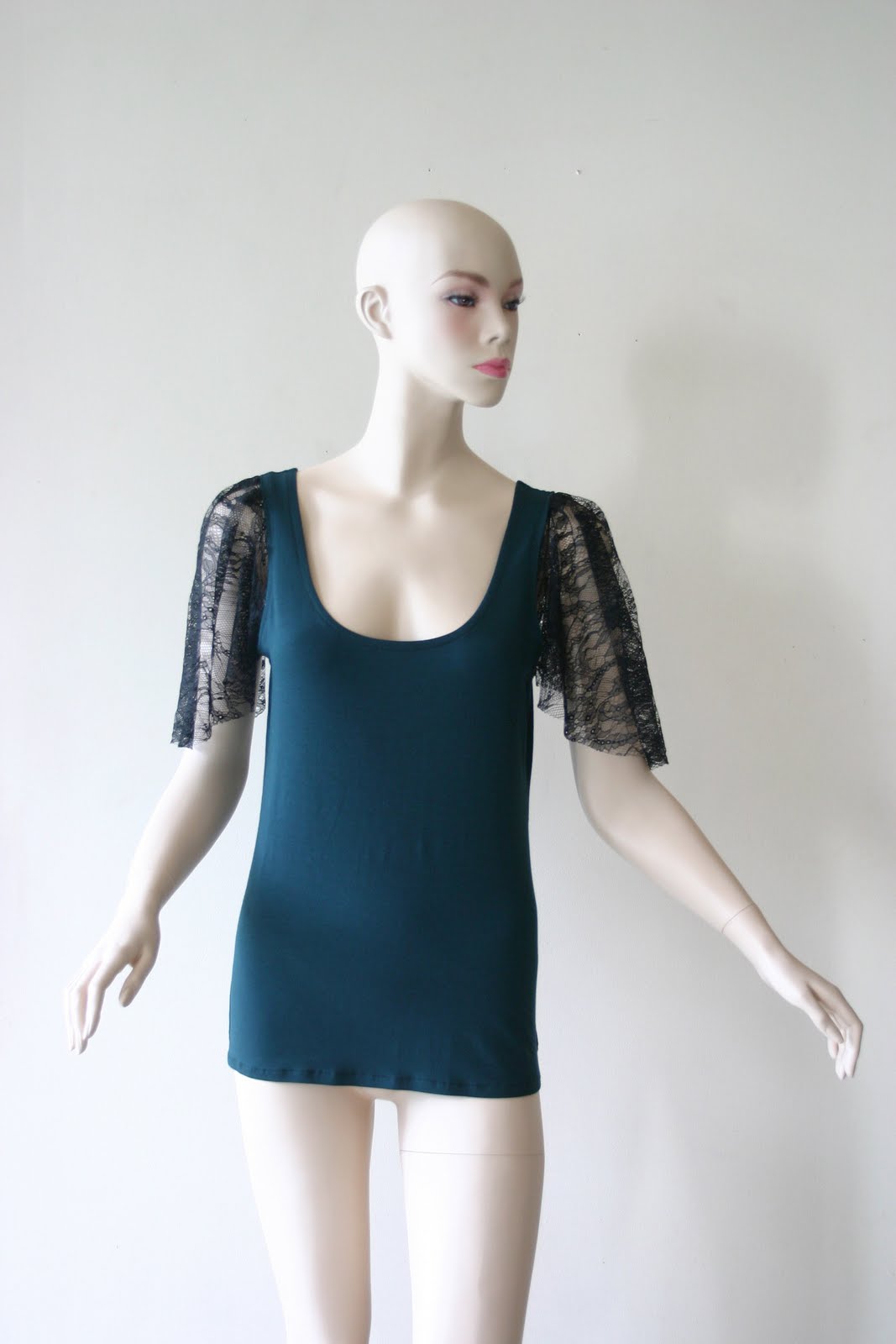 Ribbon On A Bombshell: Lace Wing Singlet