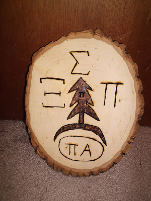 Stochastic Adventures: Xi Sigma Pi Plaque