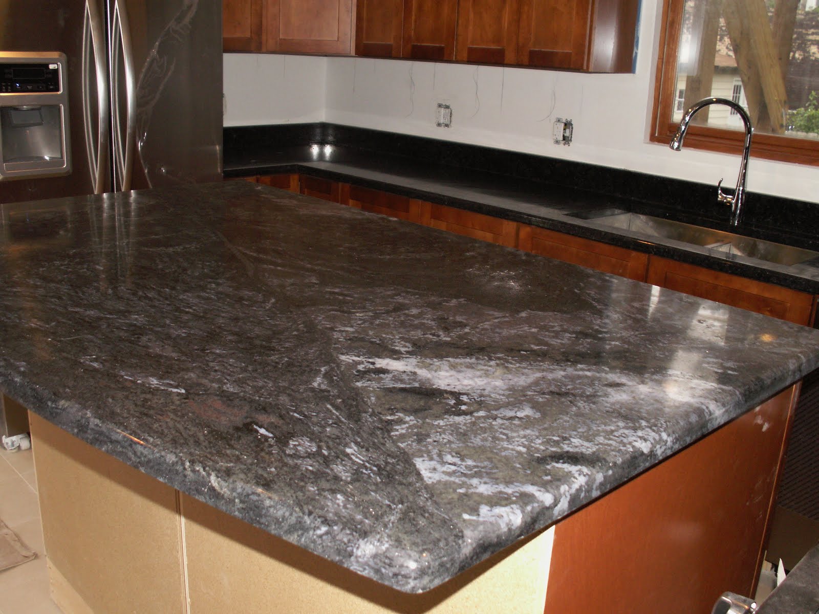 JC Granite: Amazone Blue Star with Granite all the way to the ceiling ...
