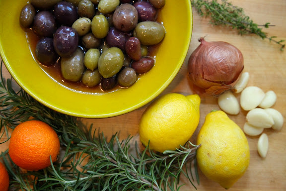 dollop: {nibble} warm marinated olives