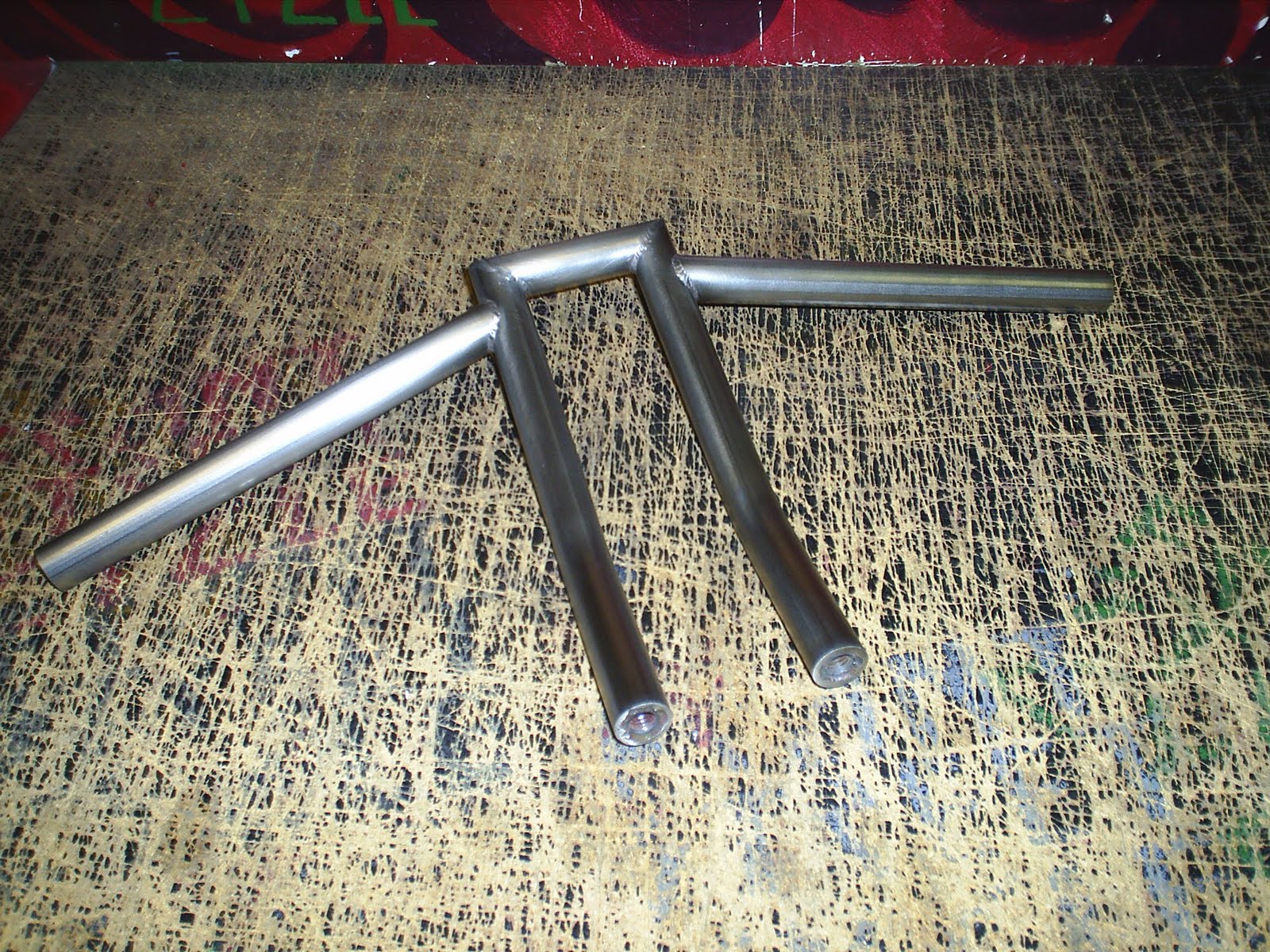 FRONT ST CYCLE: Window T bars w forward sweep