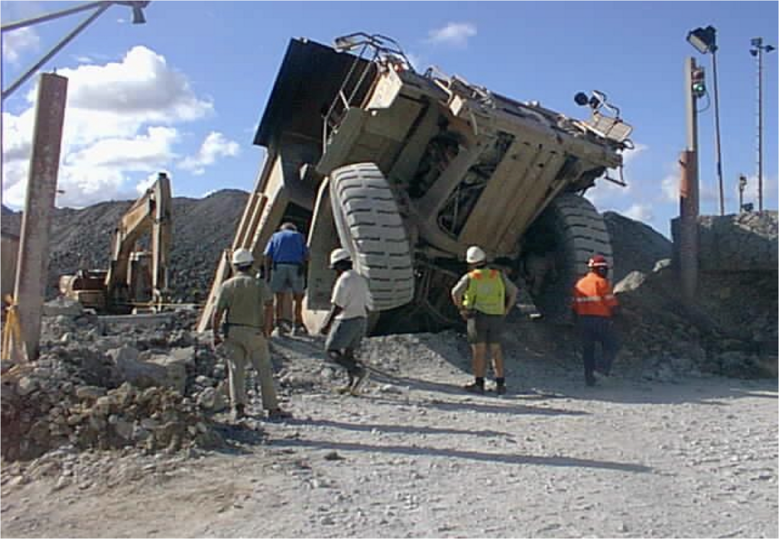 Mining Mayhem: Rear-Dumper Backwards into Hopper