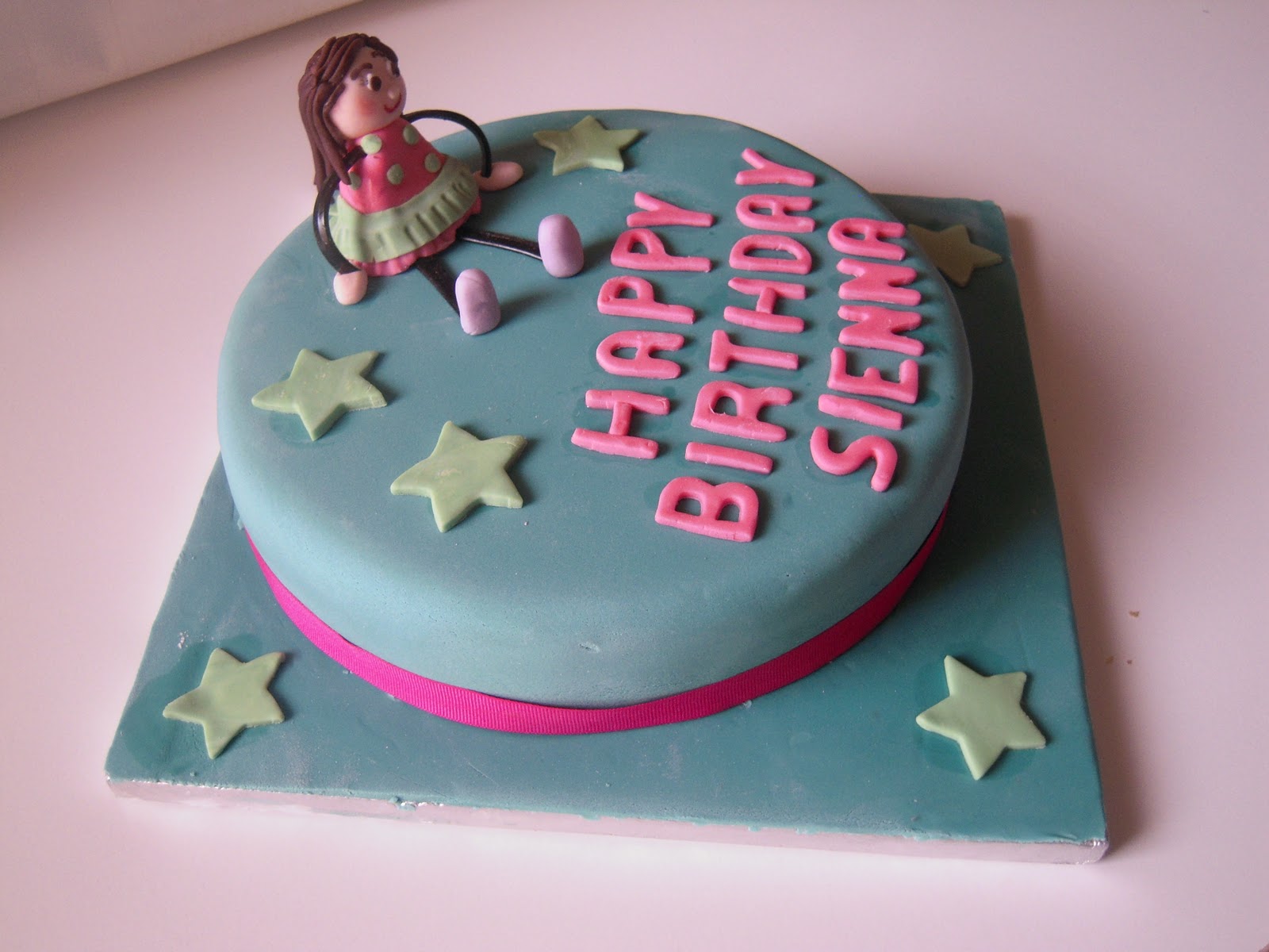Eileen Atkinson's Celebration Cakes: Girl sitting on a cake
