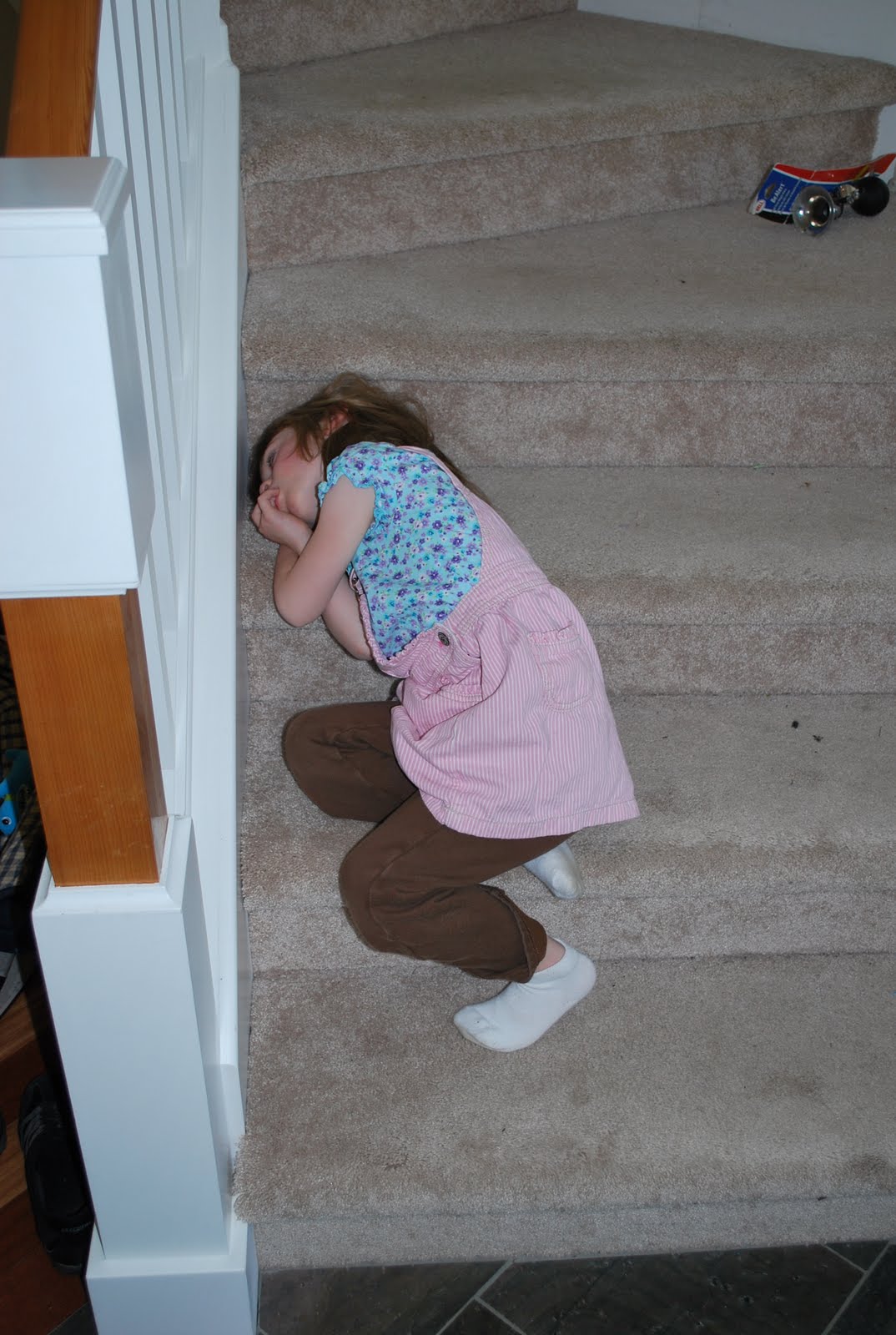 Miller Family: Sleeping on the stairs