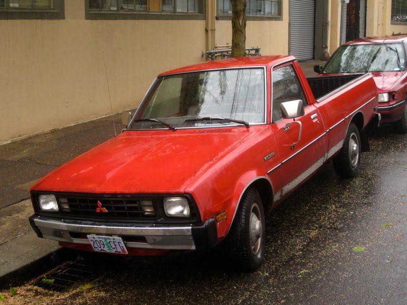 OLD PARKED CARS.: 1982 Mitsubishi Mighty Max Pickup.