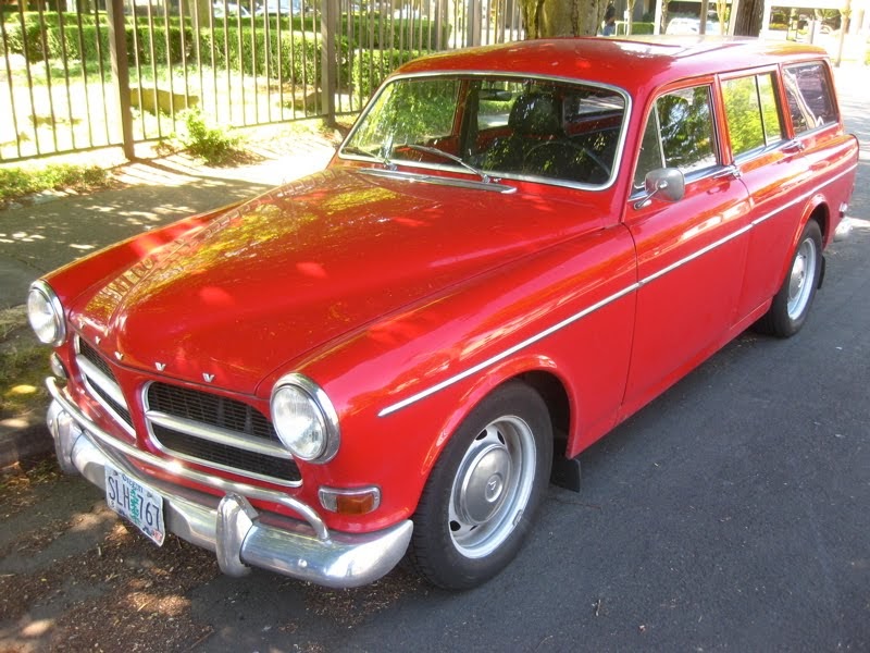 OLD PARKED CARS.: 3 Volvo Wagons: 1964 Volvo Amazon 122S.