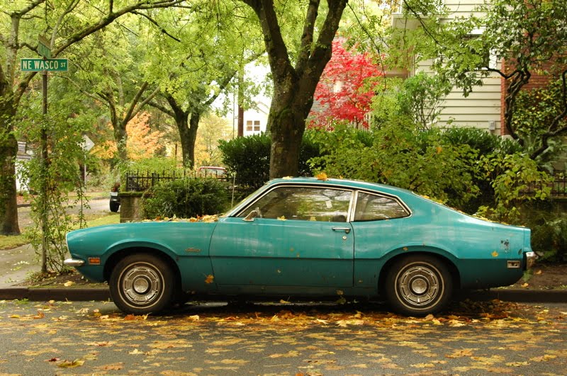 OLD PARKED CARS.: #1 of 2: 1970 Ford Maverick Fastback.