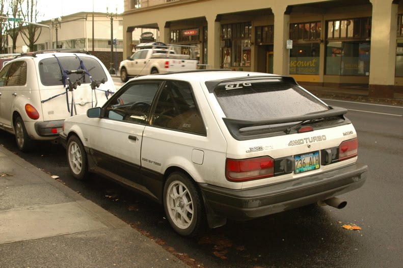 OLD PARKED CARS.: 1988 Mazda 323 GTX Turbo 4wd.