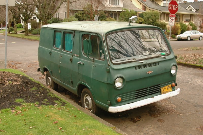 OLD PARKED CARS.: 1965 Chevy Van.