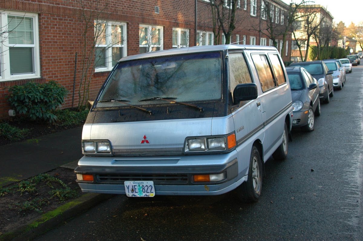 OLD PARKED CARS.: 1988 Mitsubishi L300 LS Van.