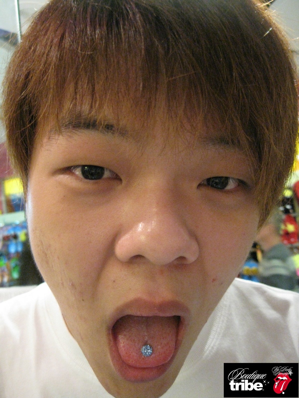 Tatto + Piercing Body: Tongue piercing