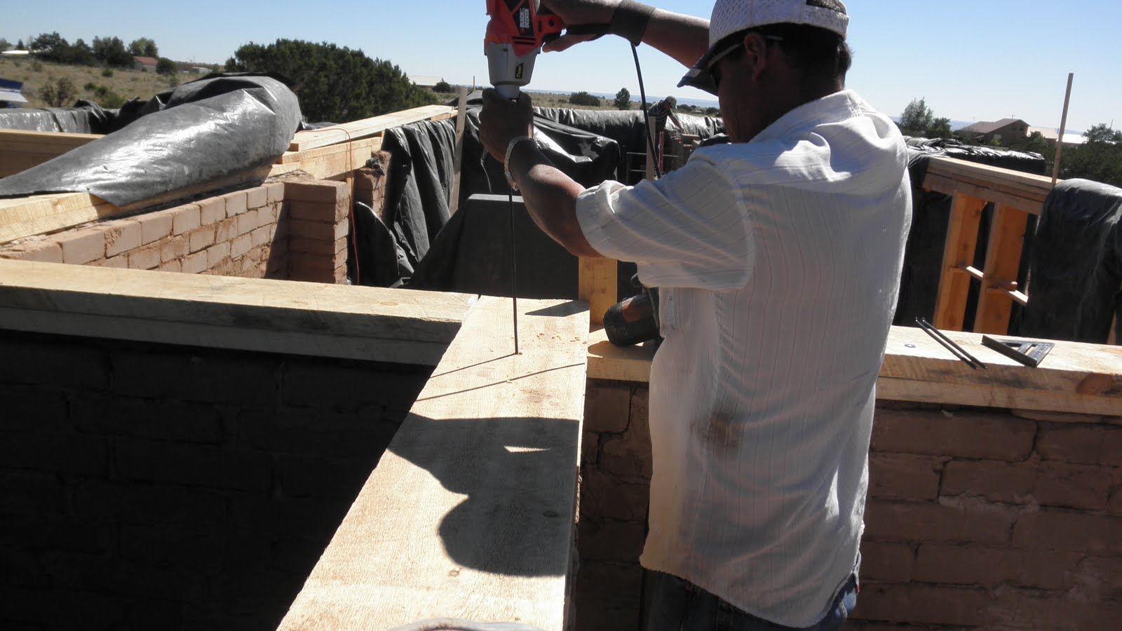 Building our Adobe Home: Bond Beams and Door Bucks.