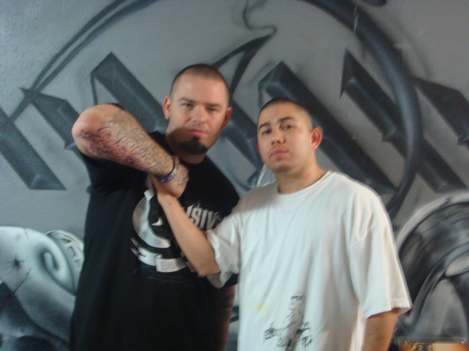 perfect tattoos designs: Paul Wall and Kid Sister tattooed by Mr Siego ...