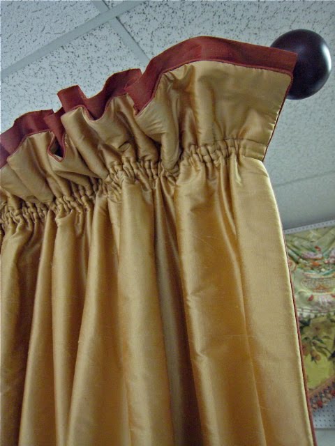 These shirred curtains are bunched towards the top and flow out freely ...