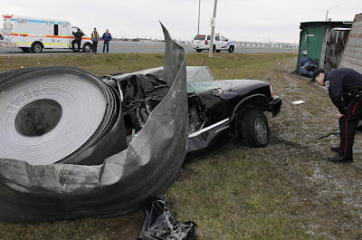 BOKISSONTHRONE NEWS: Driver cheats death after roll of steel falls onto ...