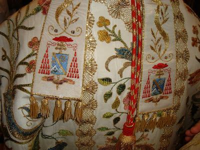 ORBIS CATHOLICVS: Custom: arms on the "infulae" of a mitre...