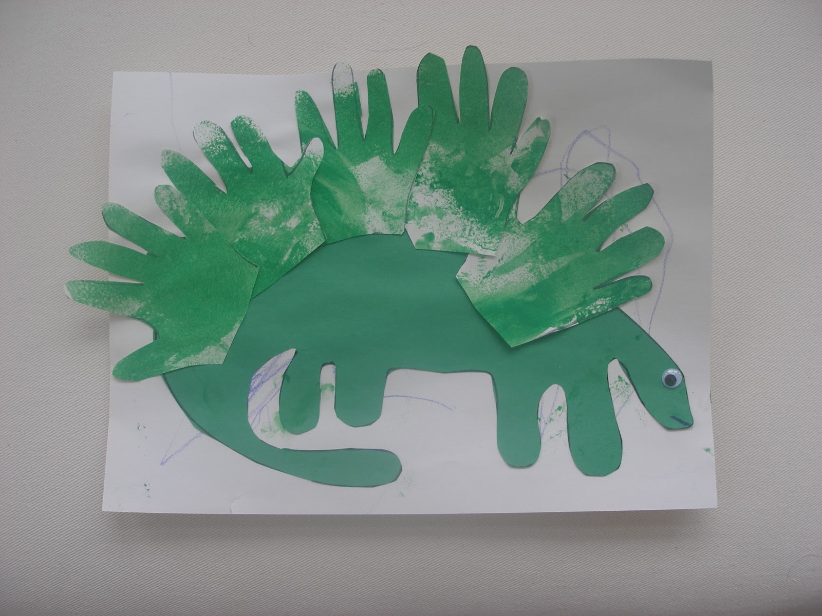 Stegosaurus Hand Print Craft | Preschool Crafts for Kids