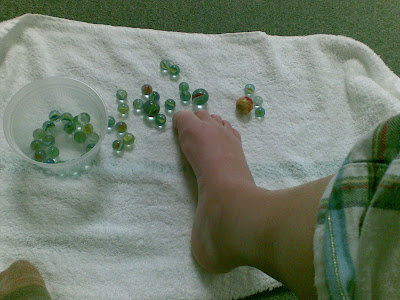 Pick up the marbles with your toes