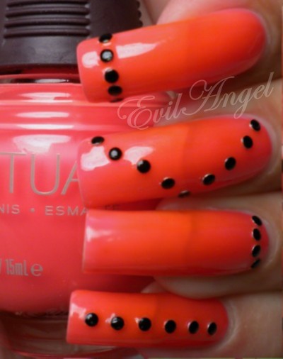 Black nail polish and lip gloss: Sparitual Pure of heart is studly