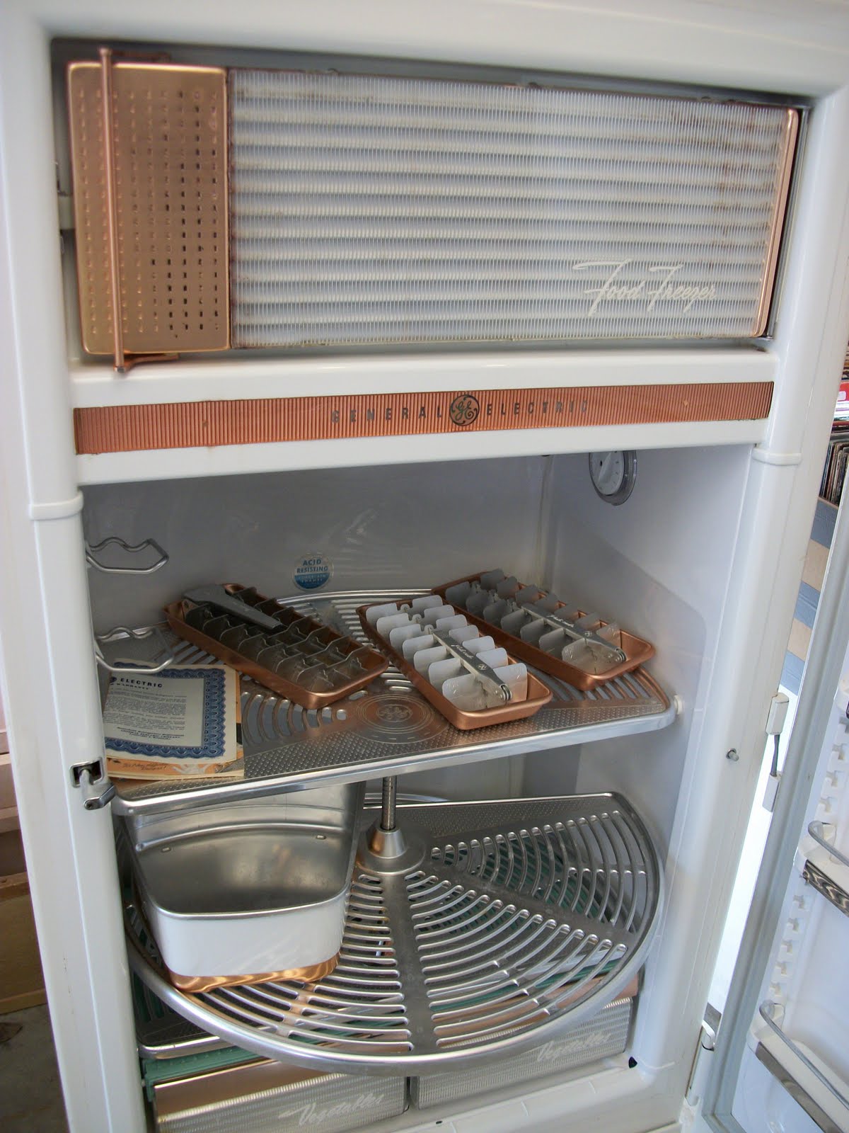 Retail Shelf Sign Holders: Refrigerator With Rotating Shelves