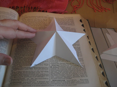 Just refold the star and take off a sliver at a time, until you like ...