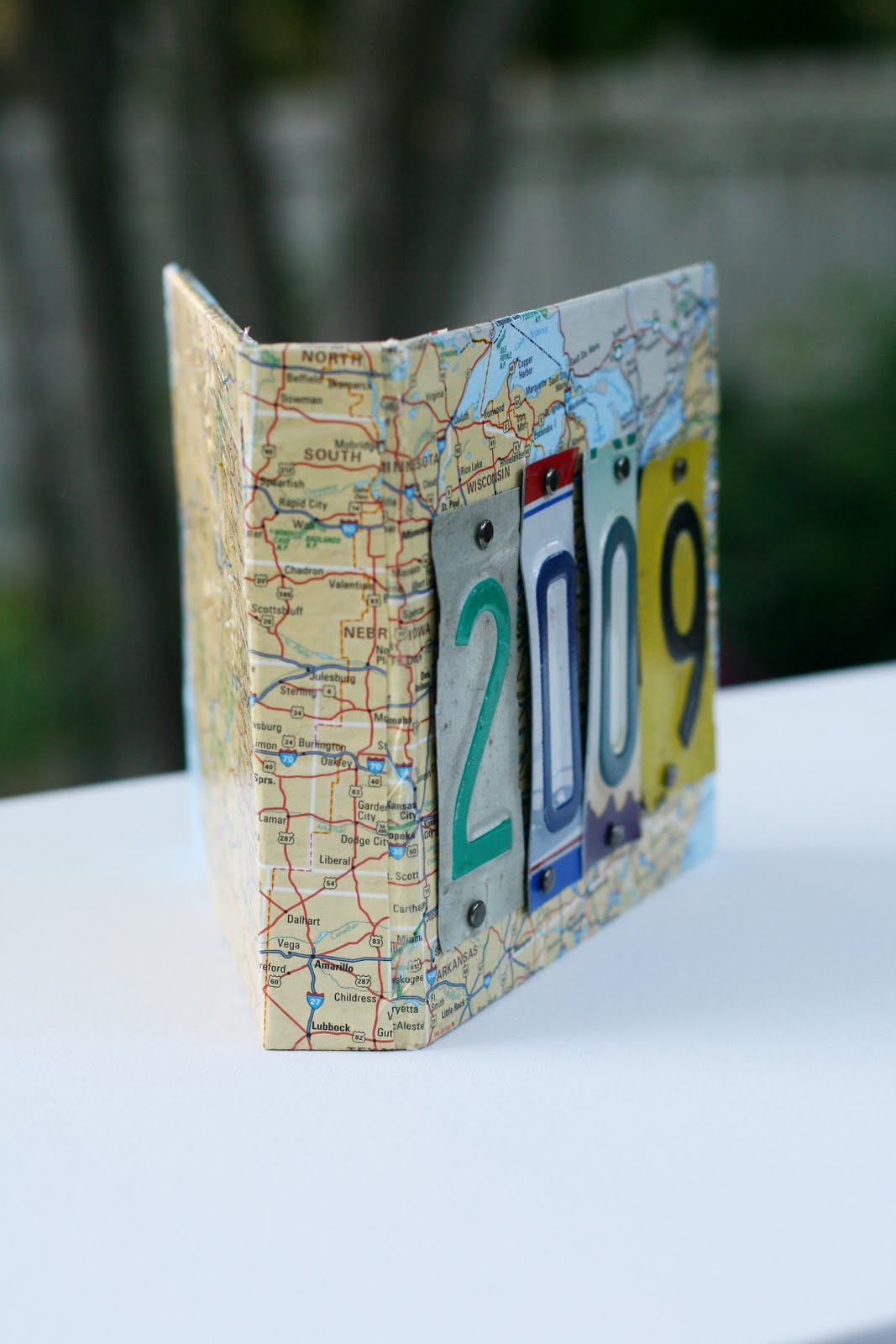 Bind-It-All: Coverall + old map + Modge Podge = Vacation Album!