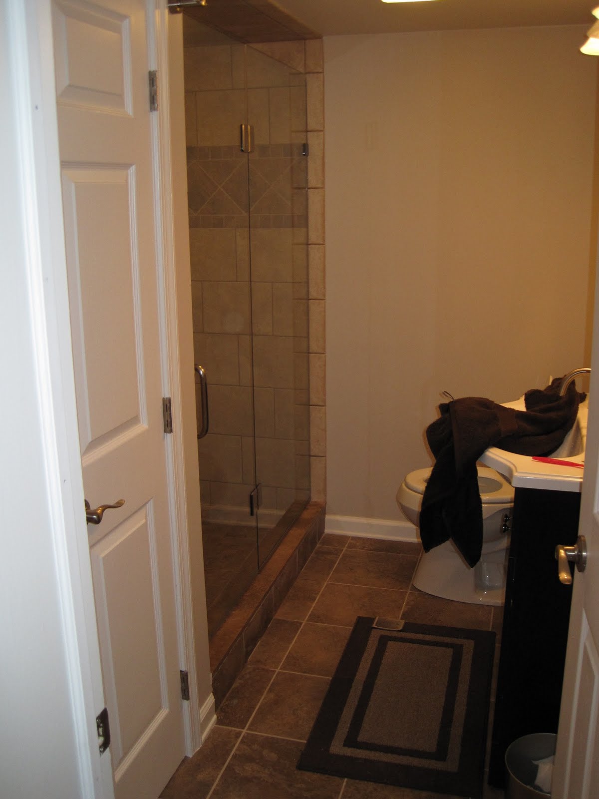 DS Tile and Stone Installations: Full basement w/ custom shower install