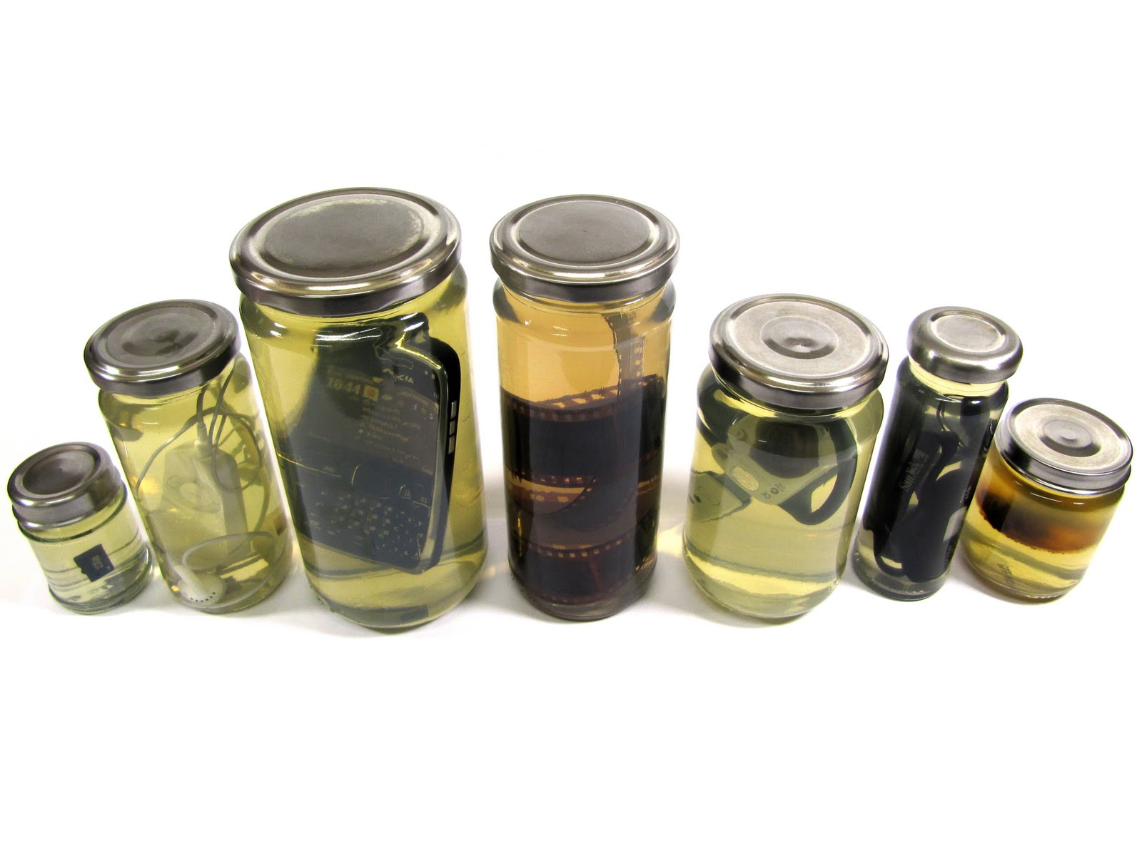 Filling jars & making new ones... - Isreal Mathew