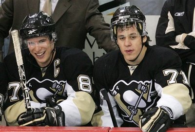 From Puck Daddy...Evgeni Malkin speaks on his experience playing with #87.