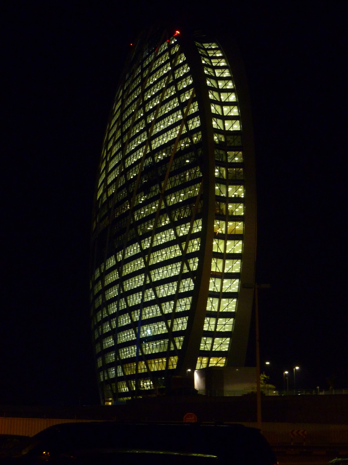 Journeys Far and Wide: Disc-Shaped Building in Al Raha, At Night