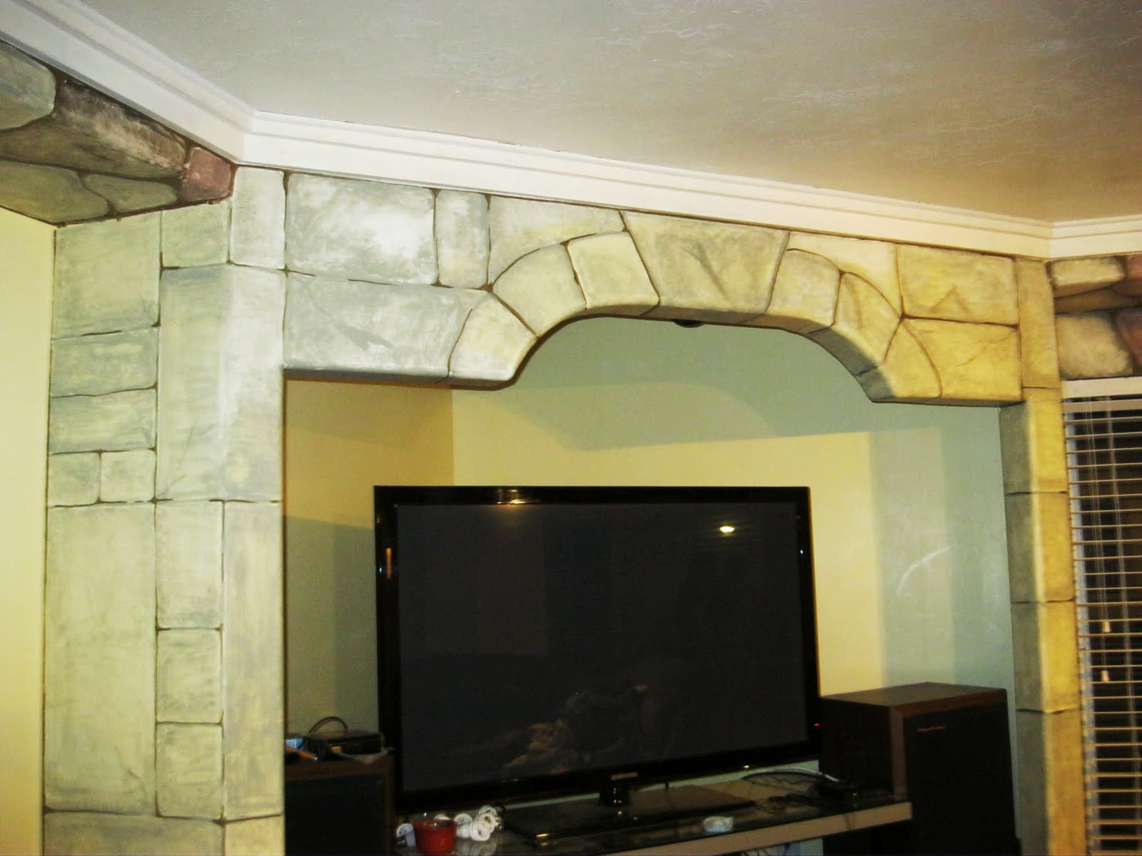 Bawden Fine Murals: Faux painted brick and stone for a castle look.