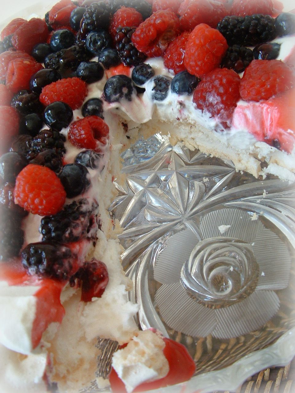 Summer Berry Pavlova with a Raspberry Coulis Sauce - A Feast For The Eyes