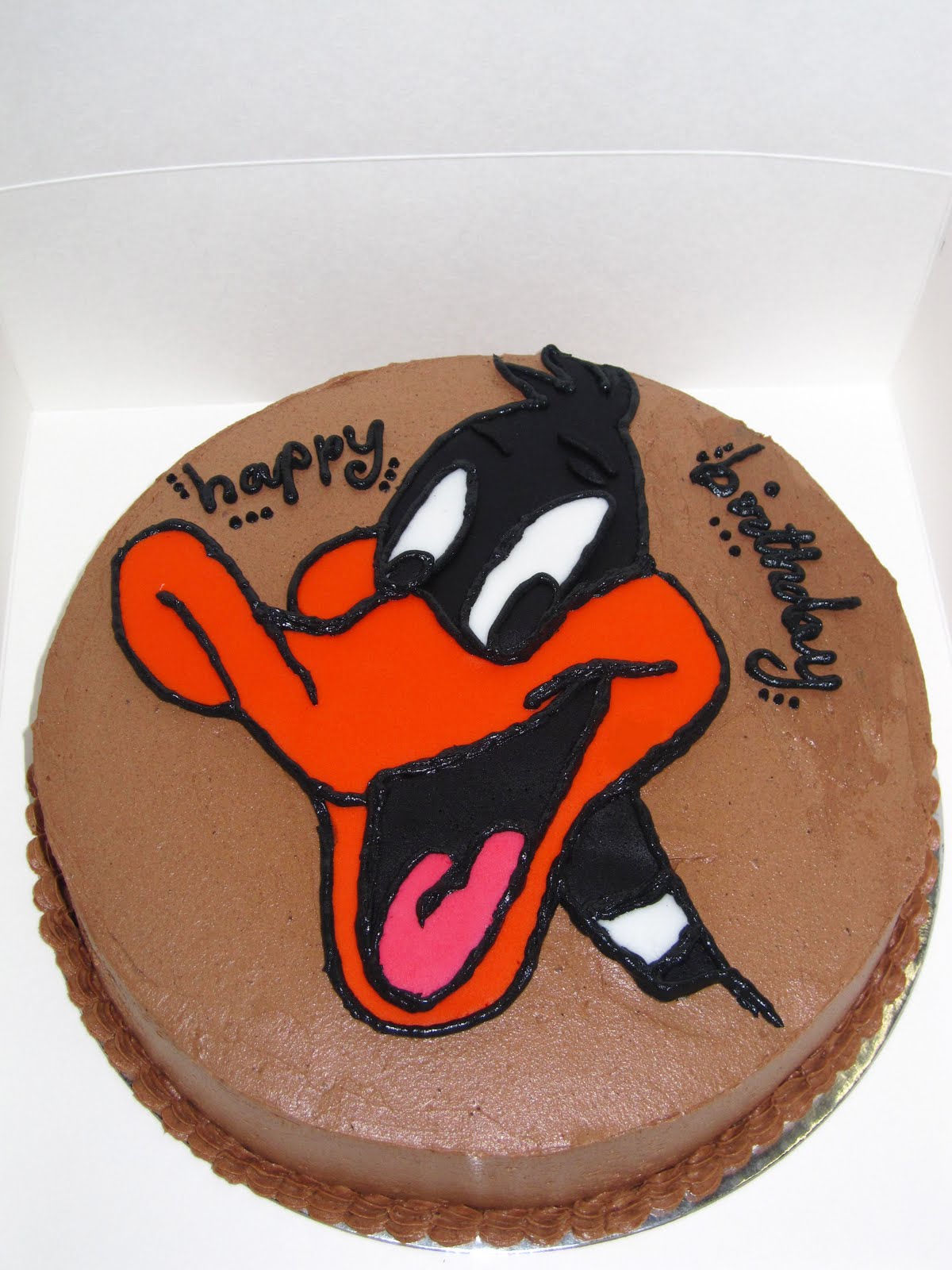 CRAVINGS cakes cupcakes and cookies: DISTH-PICABLE! Daffy Duck Cake