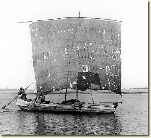 Indian boat with a square sail floating along the Ganges River - Bengal ...
