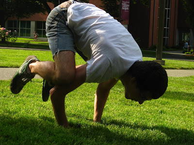 Cop A Squat: Hand stand squat.