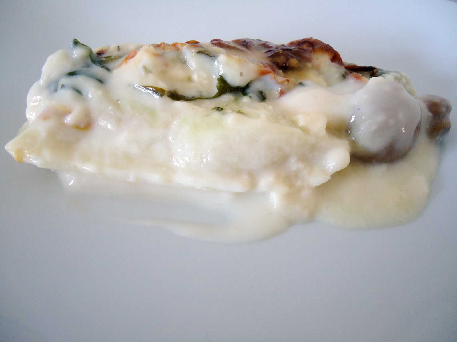 Filetes de Pescada Gratinados com Espinafres e Cogumelos - Sabores da Alma