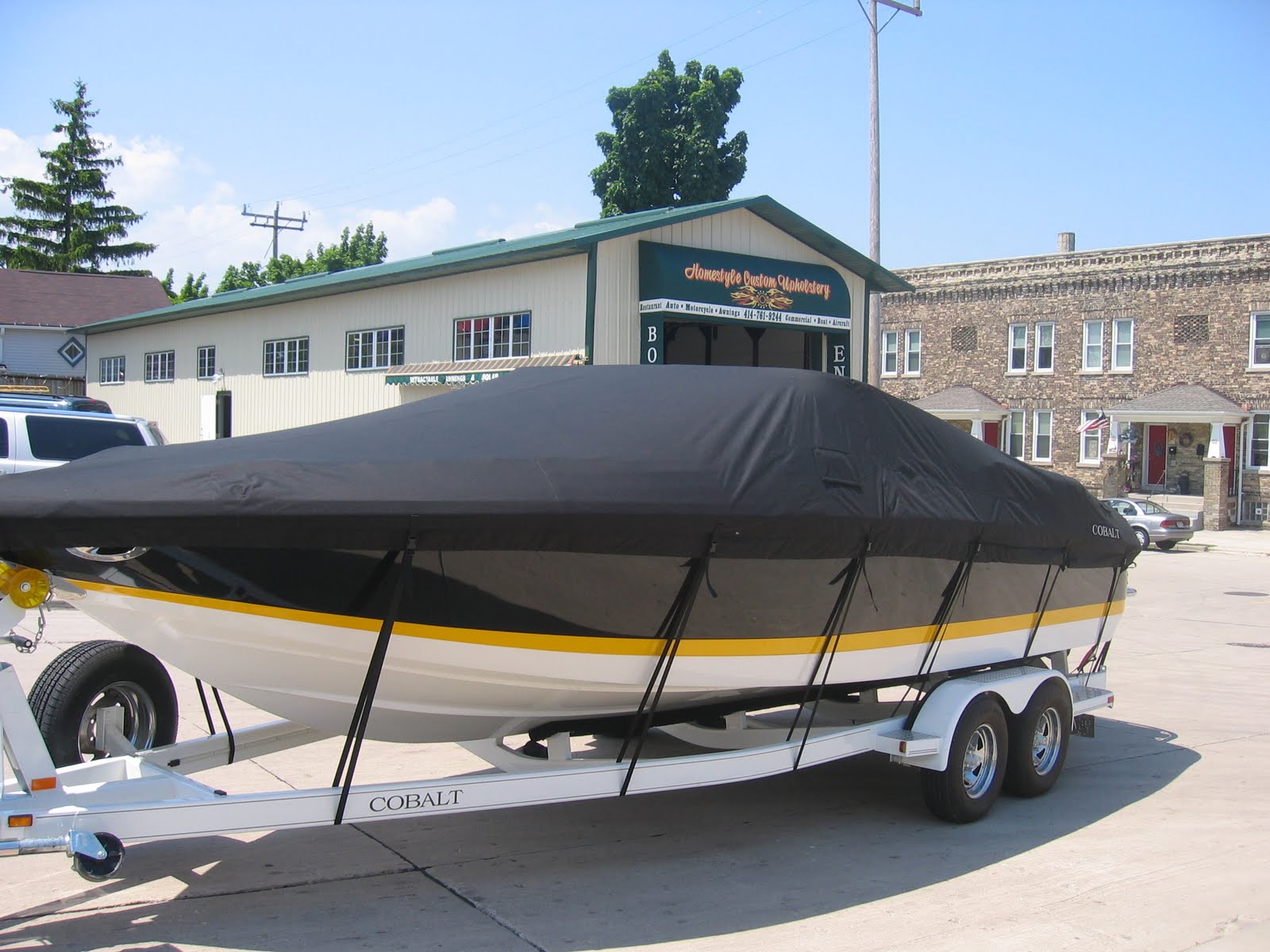 Homestyle Custom Upholstery and Awning: Black Boat Cover