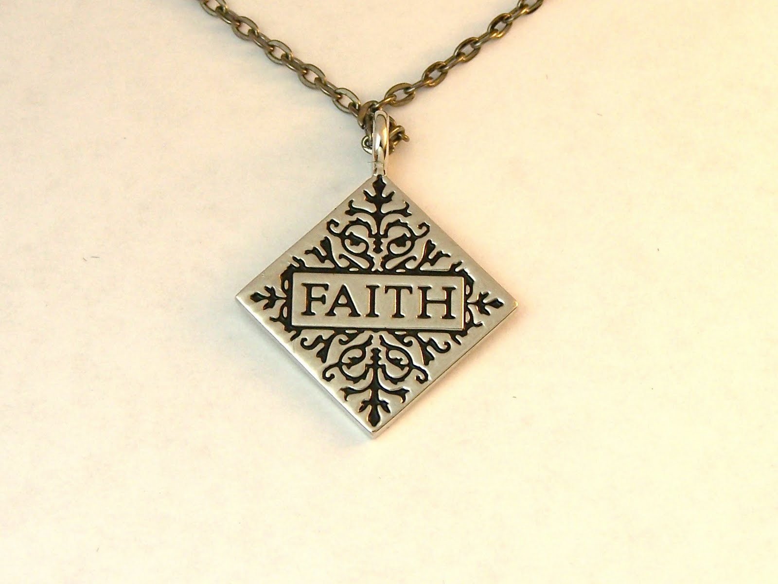 CHILDREN'S CHARITY STORE...: Silver Faith Pendant $15 donation