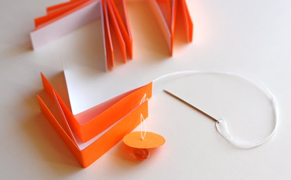 DIY striped paper ornament | How About Orange