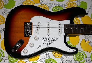 Plochmann Lane: Robbie Robertson autographed guitar pick & video proof.