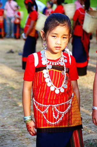 CHANGMAR HODA ALAAM: A chakma child in traditional Dress
