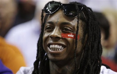 Popo in my crib: Li’L Wayne supports D-Wade’s Band Aid Craze